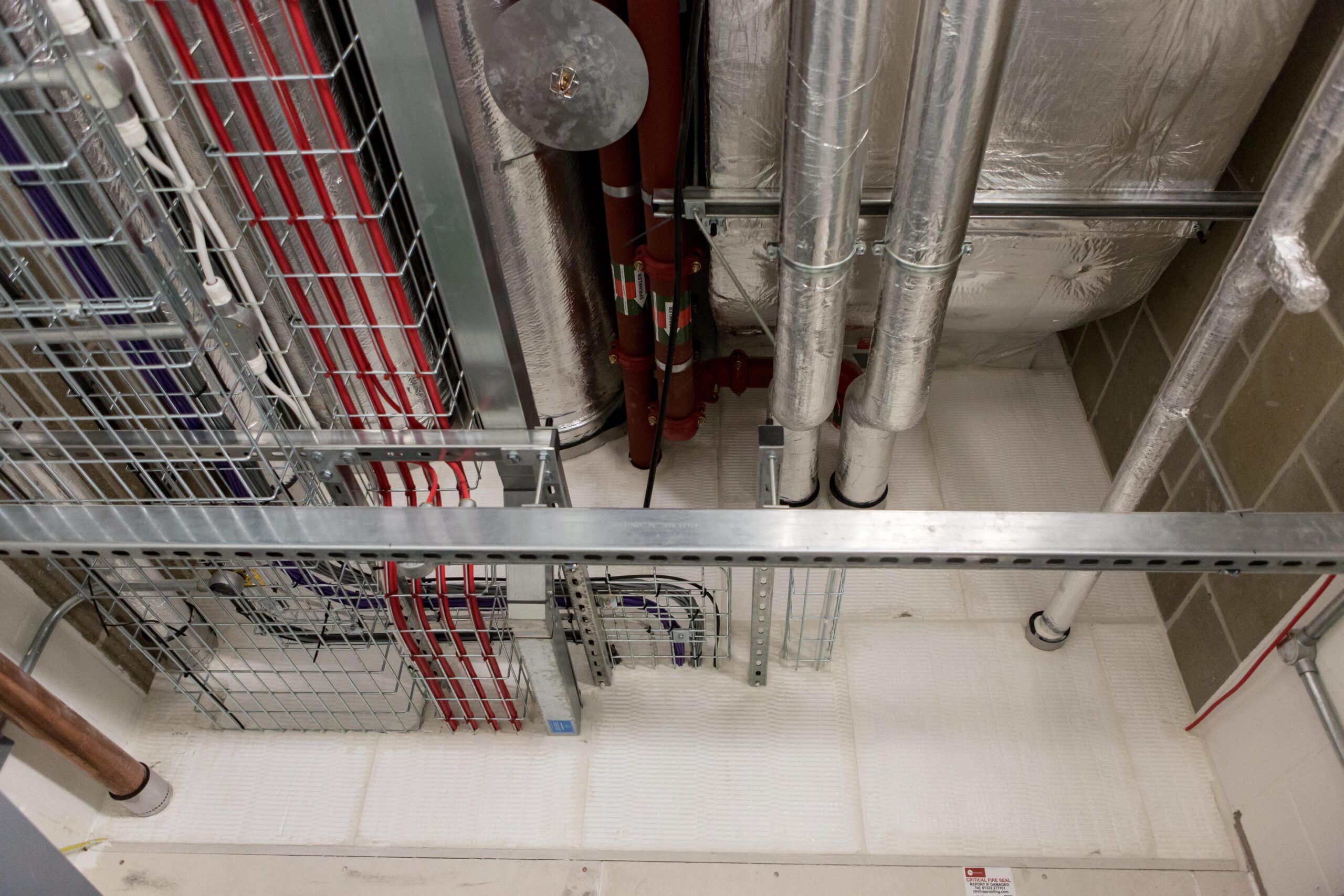 Preventing the spread of fire through pipes with fire stopping